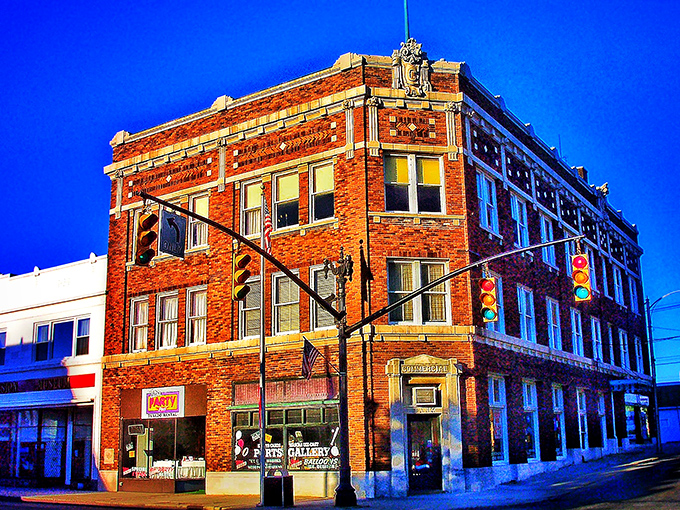 Corner buildings like this one have witnessed generations of first dates, business deals, and town gossip—if only those decorative cornices could talk.