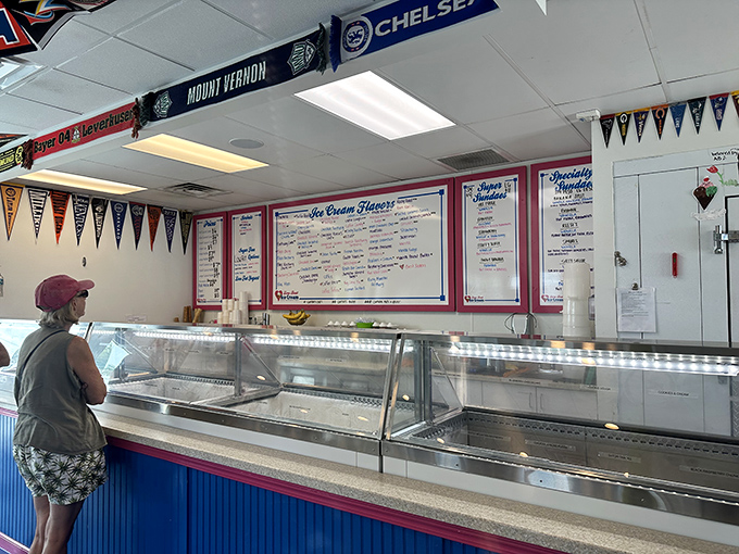 The ordering counter—where dreams come true and decisions become increasingly difficult as you scan the flavor board that stretches to infinity.