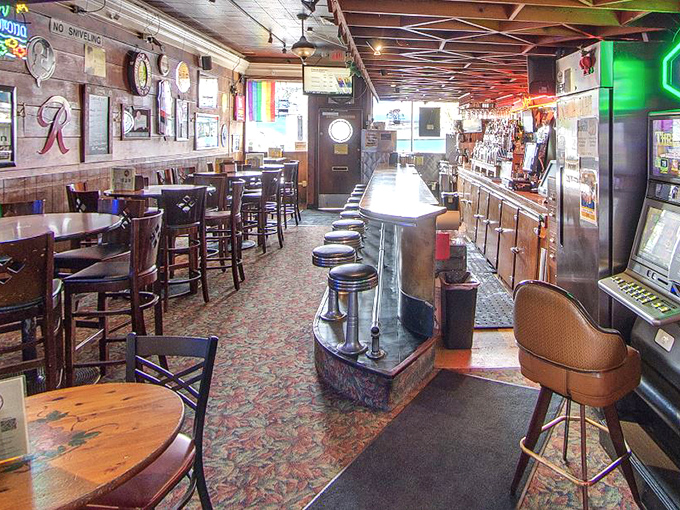 The long, narrow layout creates an intimate atmosphere where every seat feels like you're part of the Mock Crest family.