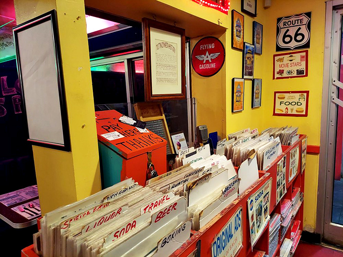Vintage Americana lines the walls while records await browsing—this isn't decoration, it's a museum of mid-century cool you can touch.