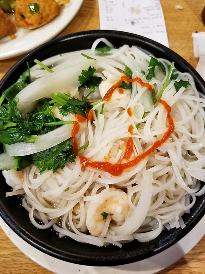 This bowl of pho with its delicate noodles and fresh herbs offers a moment of refined elegance in the midst of buffet abundance.