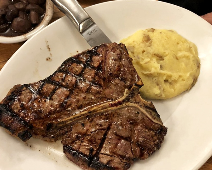 This porterhouse doesn't just command attention—it demands respect. The mashed potatoes know better than to try to upstage the main attraction.
