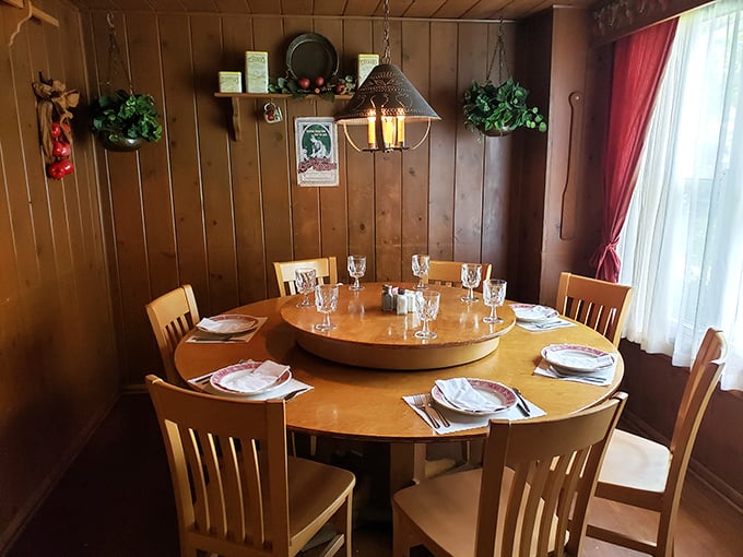 Rustic elegance in wood paneling and simple furniture—a dining room that whispers stories of family celebrations spanning generations.