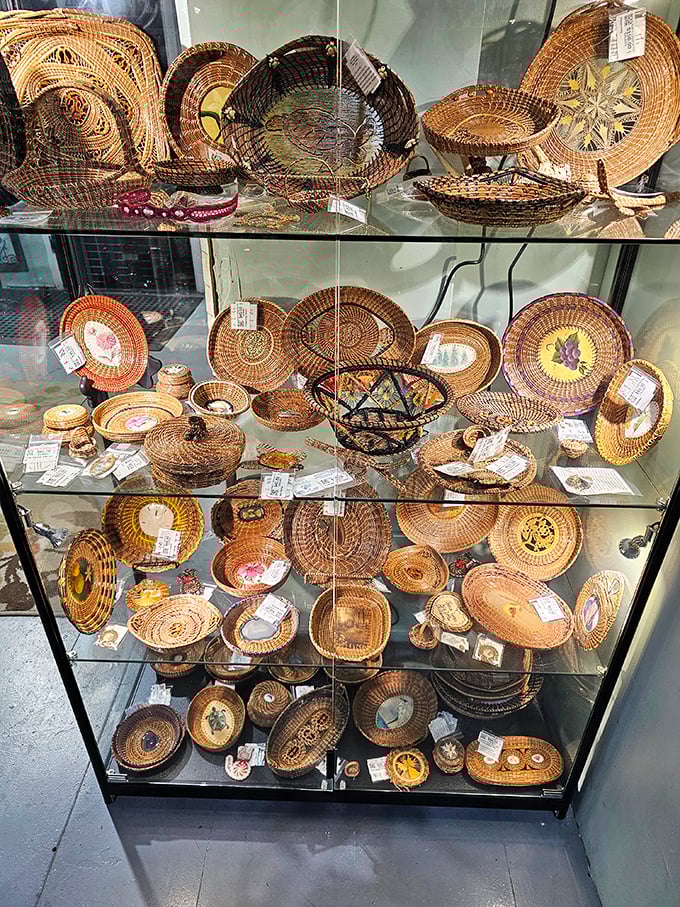 A glass case of woven baskets showcases the artistry of everyday objects—functional beauty that's stood the test of time.