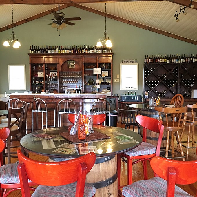 Wine country, Newberry-style—where barrel tables and cherry-red chairs invite conversations that start with tasting notes and end with life stories.