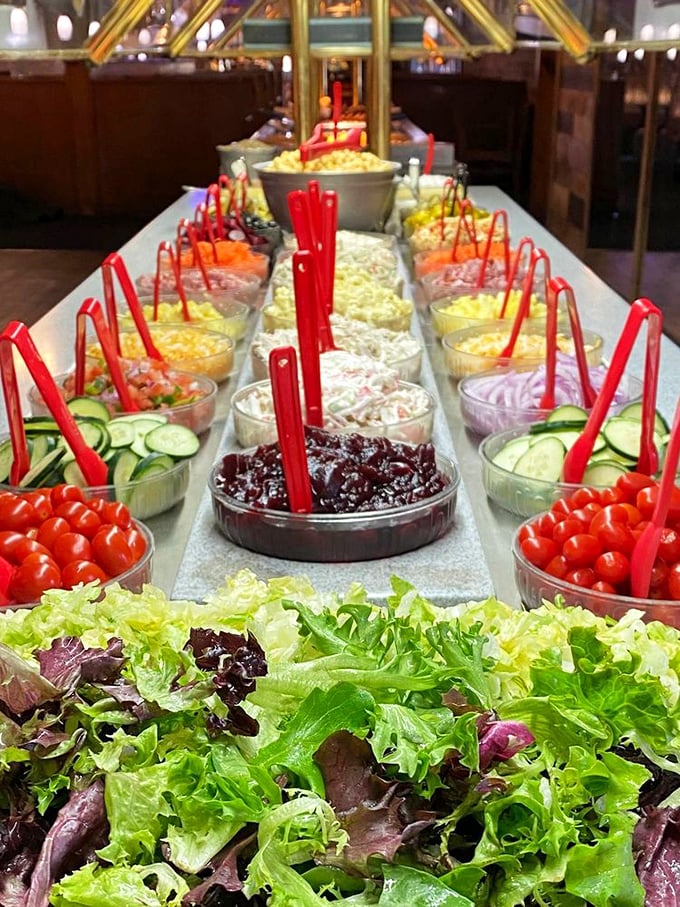 The salad bar—where good intentions meet genuine deliciousness. Fresh vegetables and toppings that make eating greens feel less like penance and more like pleasure.