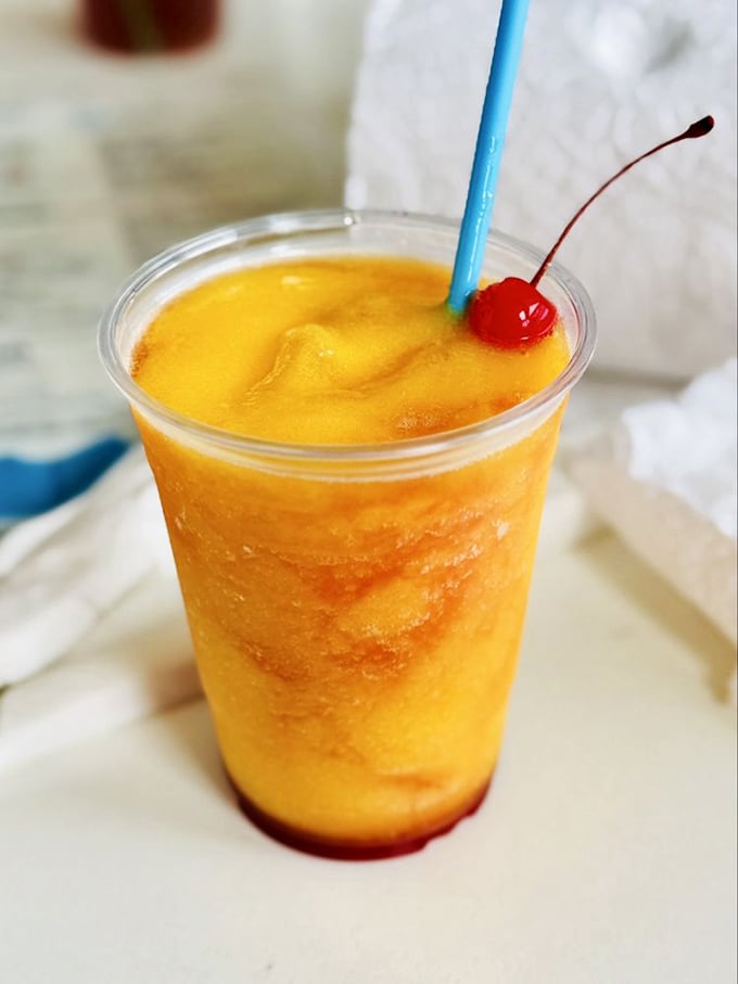 A frozen concoction that helps you hang on—sunshine in a cup with that cherry on top saying, "Yes, you deserve this."