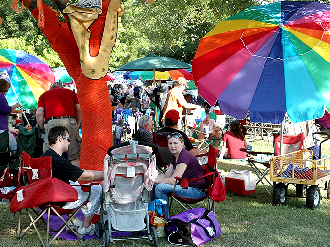 The Smoky Hill River Festival transforms Salina into a rainbow-hued celebration. Those colorful umbrellas aren't just for shade—they're happiness canopies.