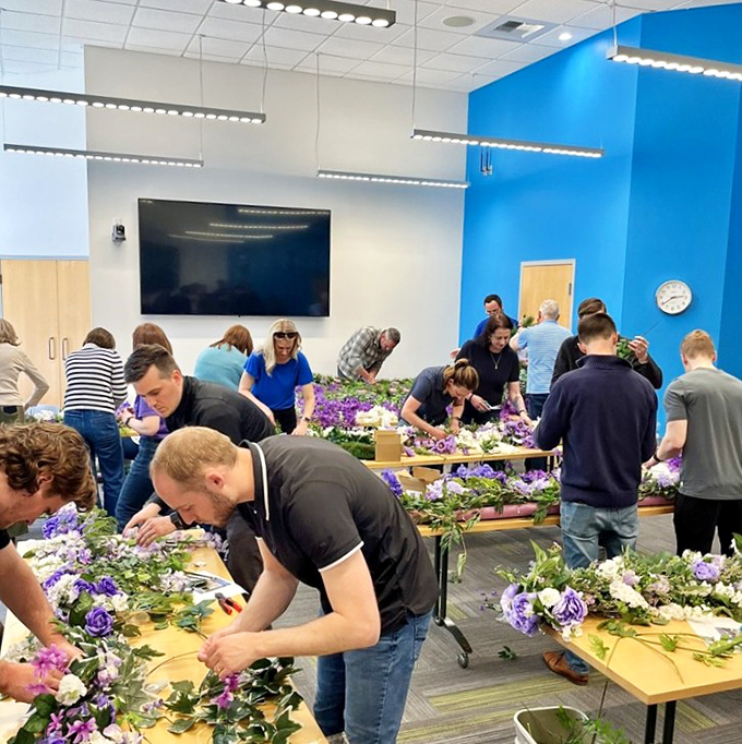 Community workshops like this floral arrangement class demonstrate Spokane's social connectivity, where making friends doesn't require expensive membership fees.