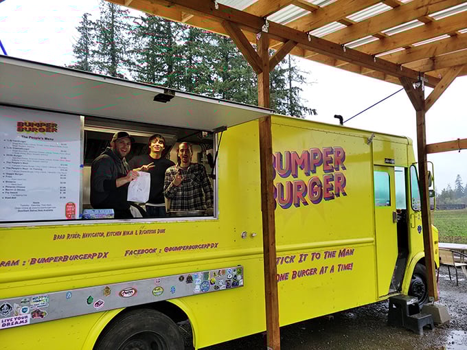 The bright yellow Bumper Burger truck isn't just a kitchen – it's a stage where culinary magic happens daily, served with genuine smiles and Oregon hospitality.