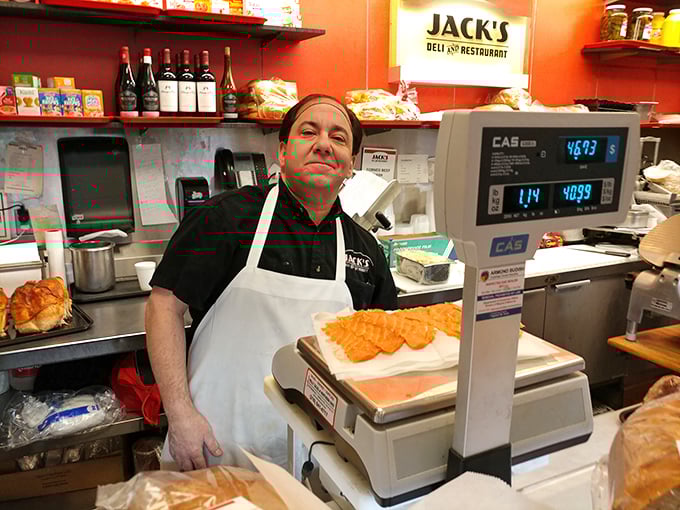 Behind every great deli is someone who knows exactly how much corned beef constitutes "too much"—and then adds a little more.