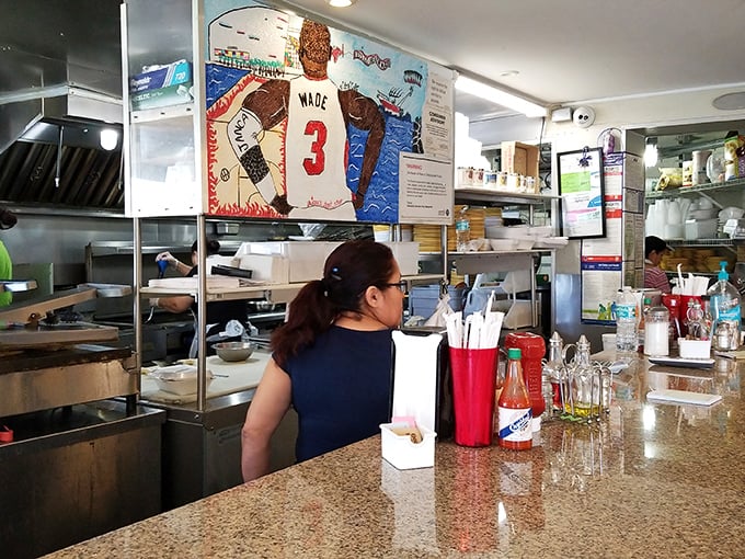 Behind every great Cuban sandwich is a kitchen crew who could probably make these masterpieces blindfolded after years of perfecting their craft.