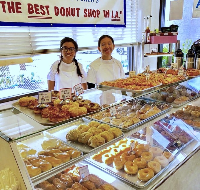 The smiles behind the counter are as warm as the fresh donuts. These folks are the true artists of Los Angeles.