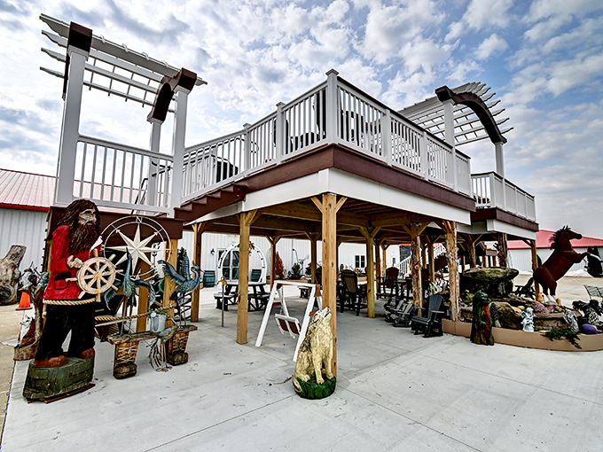 The outdoor display area features wooden structures and decorative pieces that transform ordinary yards into conversation starters.