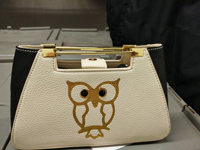 Who gives a hoot about retail prices? This owl-adorned handbag combines whimsy and practicality – the perfect thrift store score.