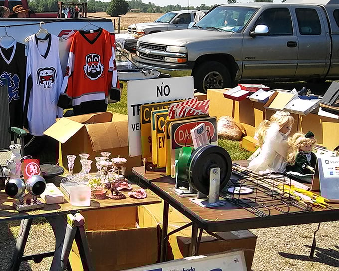 Sports jerseys and vintage signs create the perfect man-cave starter kit. That "No Trespassing" sign speaks to my soul.