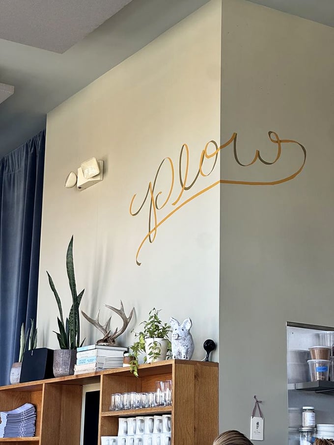 Even the wall decor says "stay awhile"—elegant gold lettering and thoughtful touches that make you feel instantly at home.