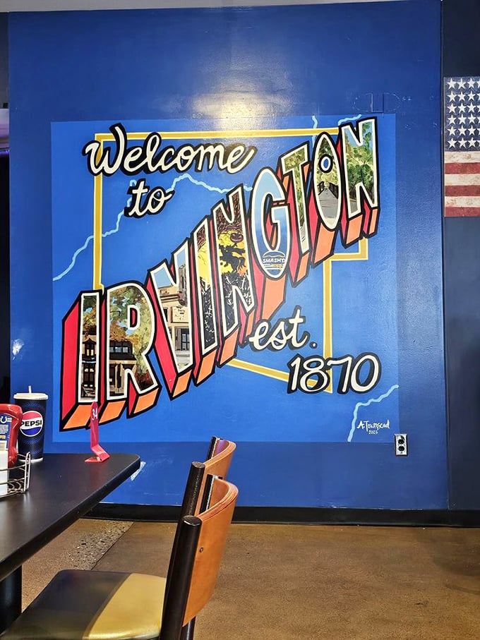 That "Welcome to Irvington" mural isn't just wall decoration—it's a promise. You're about to experience a taste of local pride served between two buns.