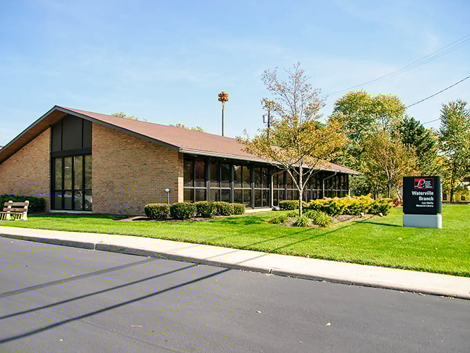 The Waterville Branch Library offers more than books—it's a community gathering place where ideas and stories flow as freely as the nearby river.