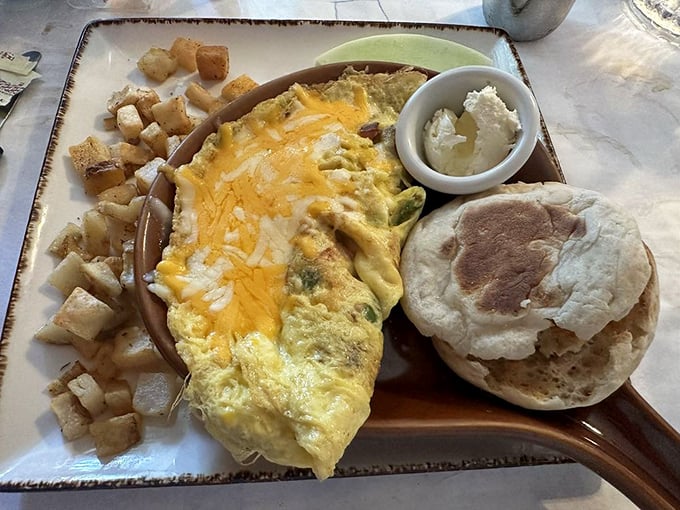 This Western omelet doesn't just whisper "good morning"—it belts it out with cheese, veggies, and a side of carbs for good measure.