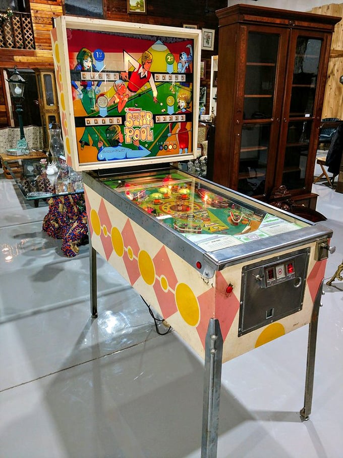 This vintage "Star Pool" pinball machine isn't just a game – it's interactive art from an era when entertainment required quarters, not downloads.