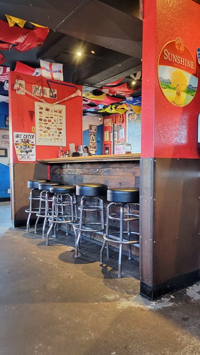 The bar area offers prime seating for solo diners or those who want to be first in line for their fish fix.