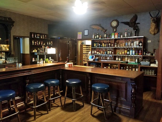 The tavern's bar area whispers tales of countless conversations fueled by good drinks and even better company.
