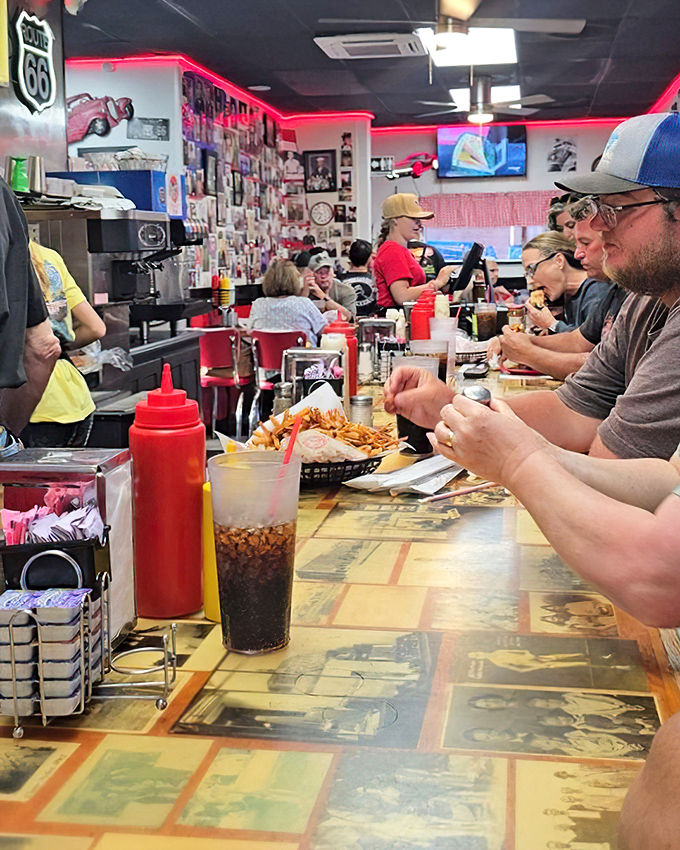 The counter at Sid's isn't just a place to eat—it's Oklahoma's most democratic institution, where everyone gets equal access to deliciousness.