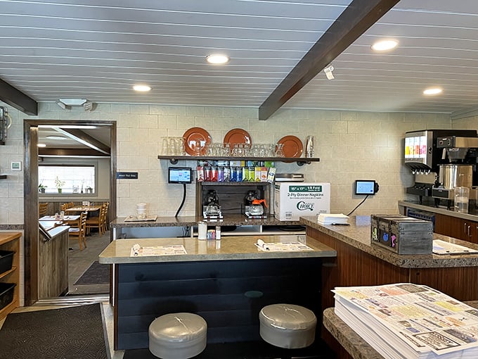The heart of operations—where orders materialize into meals and the rhythmic dance of small-town restaurant life unfolds throughout the day.
