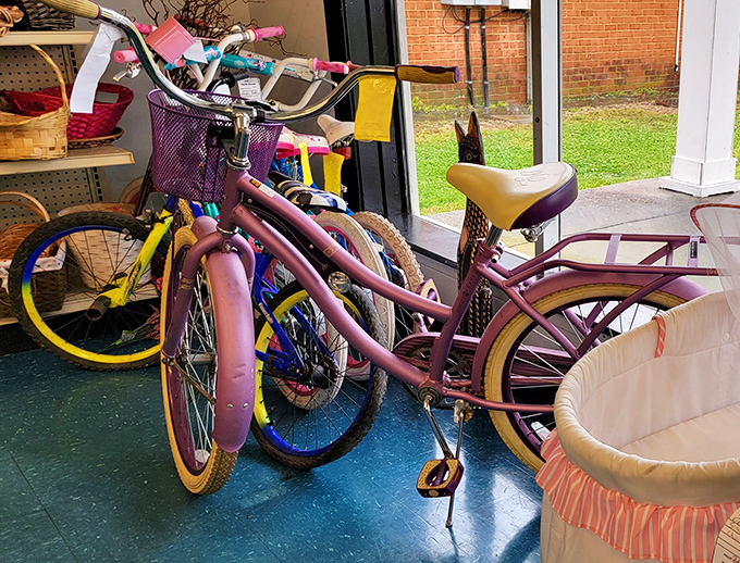 Bicycles in waiting—that pink cruiser isn't just transportation, it's freedom on two wheels. Beach rides and boardwalk adventures included at no extra charge.