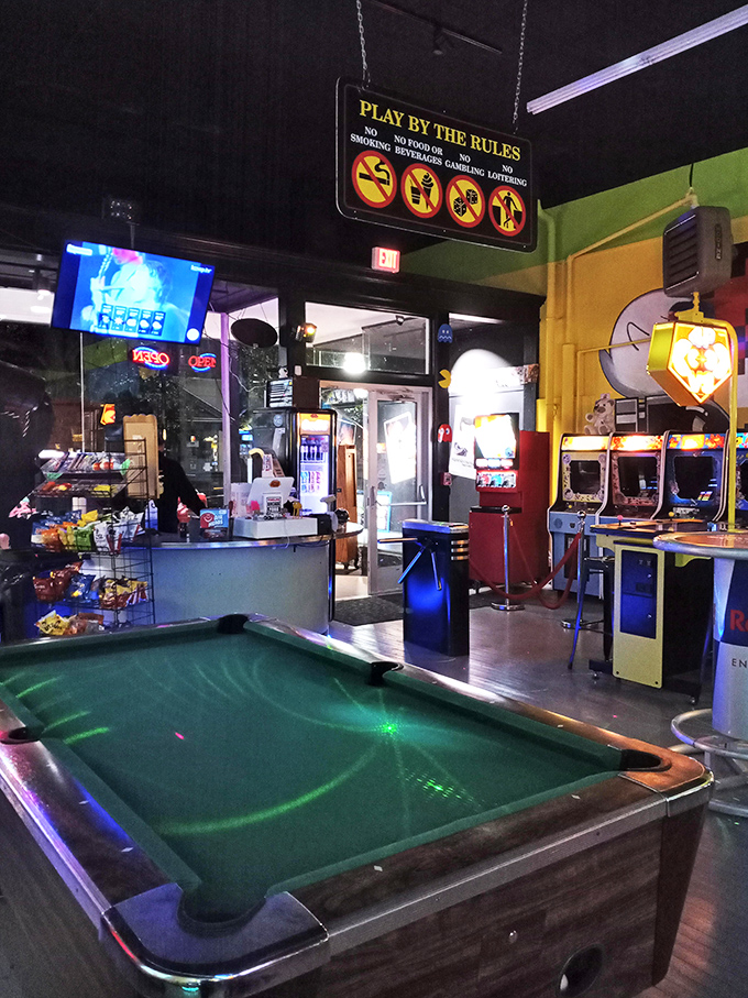 Between digital adventures, challenge friends to analog competition. This pool table has witnessed countless friendly rivalries and "just one more game" promises.