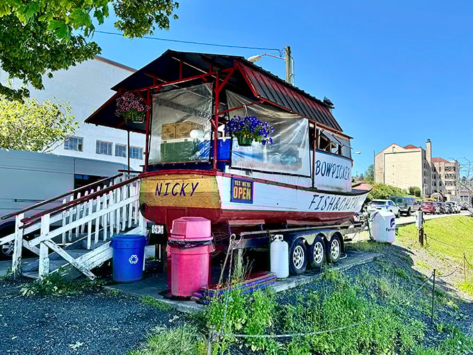 "Nicky" sits proudly on her wheels, a boat that found fame not by catching fish but by cooking them to perfection.