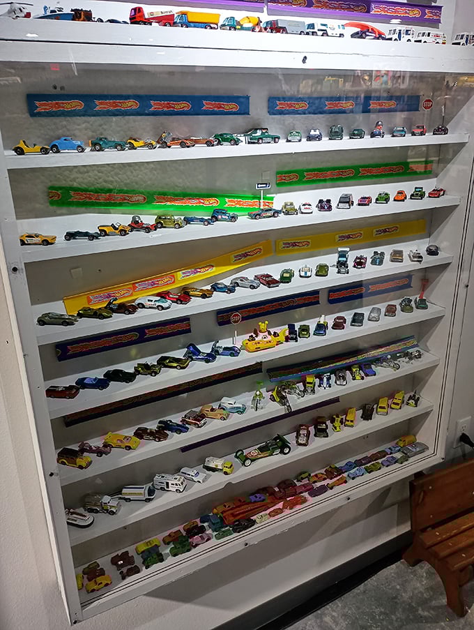 Hot Wheels heaven arranged by color and era. This rainbow of die-cast dreams represents thousands of hours of imaginative play and collector dedication.