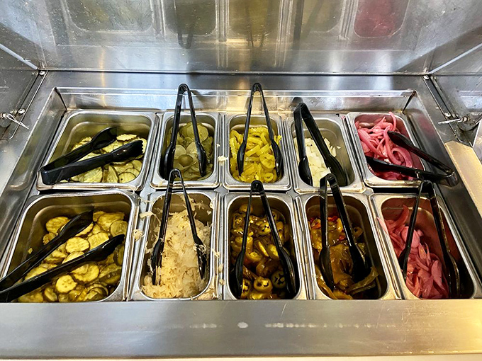 The condiment station—where pickle chips, onions, and pepper rings wait patiently to add their zingy contributions to your barbecue masterpiece.
