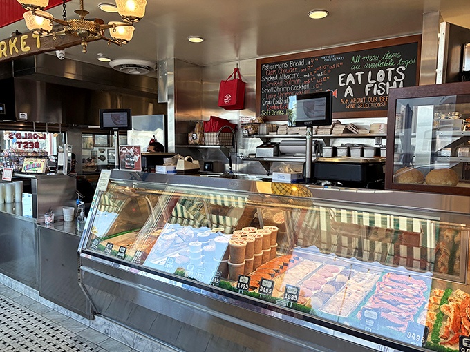 The market counter – where tomorrow's dinner meets today's lunch. A gleaming display case filled with the ocean's finest offerings, just waiting for your approval.