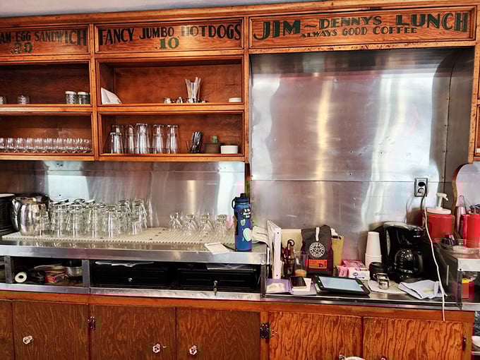 Behind these vintage wooden cabinets lie the secrets to diner magic – where ordinary ingredients transform into extraordinary comfort.