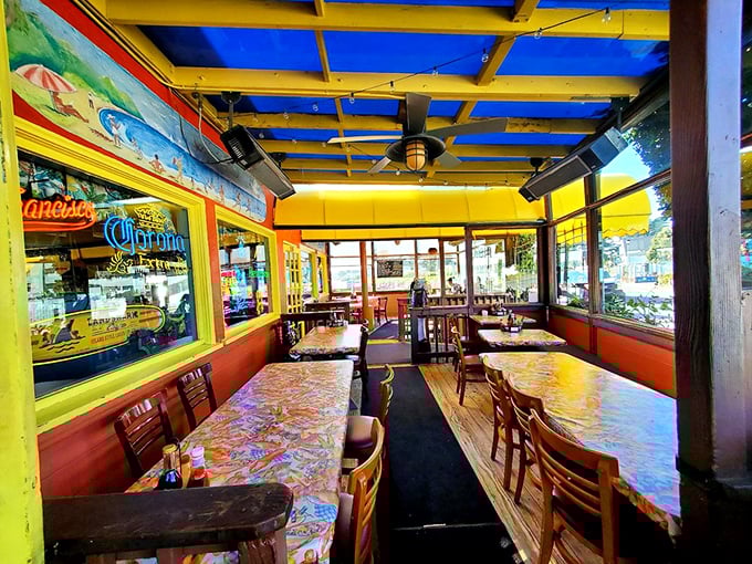 The covered patio's vibrant colors mirror the personality of the food. Every table tells stories of seafood feasts past and future.