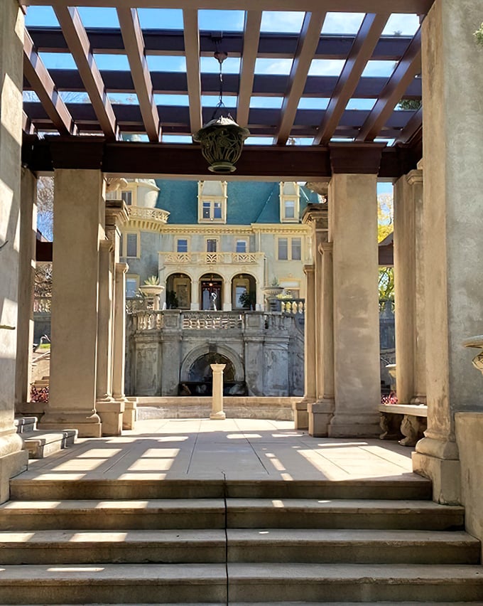 Looking through these classical columns toward the mansion creates a frame-worthy view that Instagram filters can't improve upon.