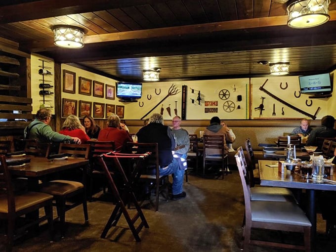 Where locals gather to debate important matters like "medium-rare versus medium" while surrounded by agricultural artifacts and good company.