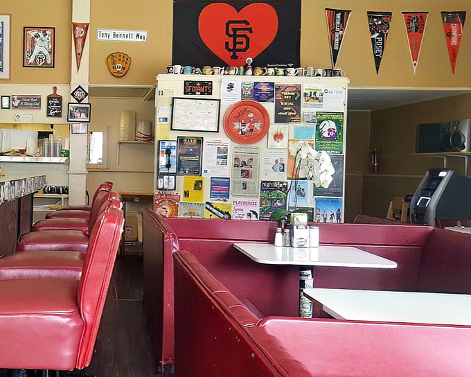 Giants memorabilia watches over diners like breakfast guardian angels. In this temple of toast, local sports loyalty is served alongside the pancakes.