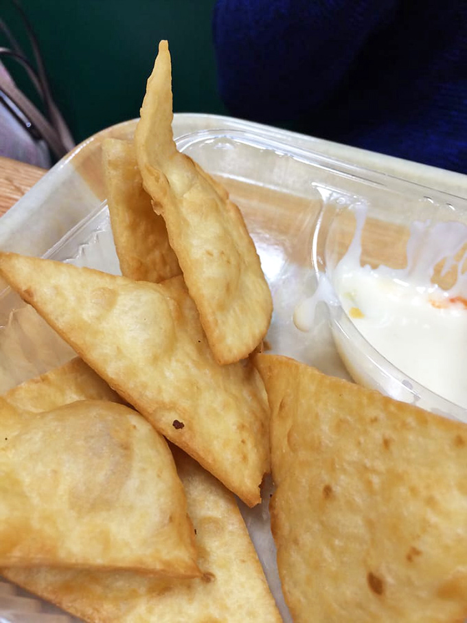 Flour chips with queso blanco—like edible playing cards dealt from the hand of a flavor magician.