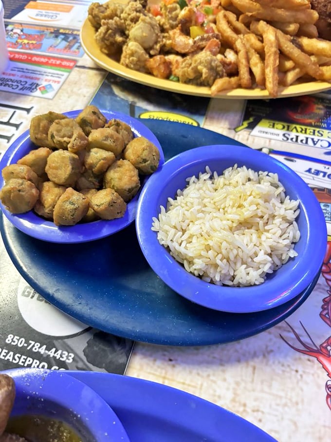 Those hush puppies nestled next to perfectly cooked rice aren't just side dishes—they're the supporting actors who sometimes steal the whole show.