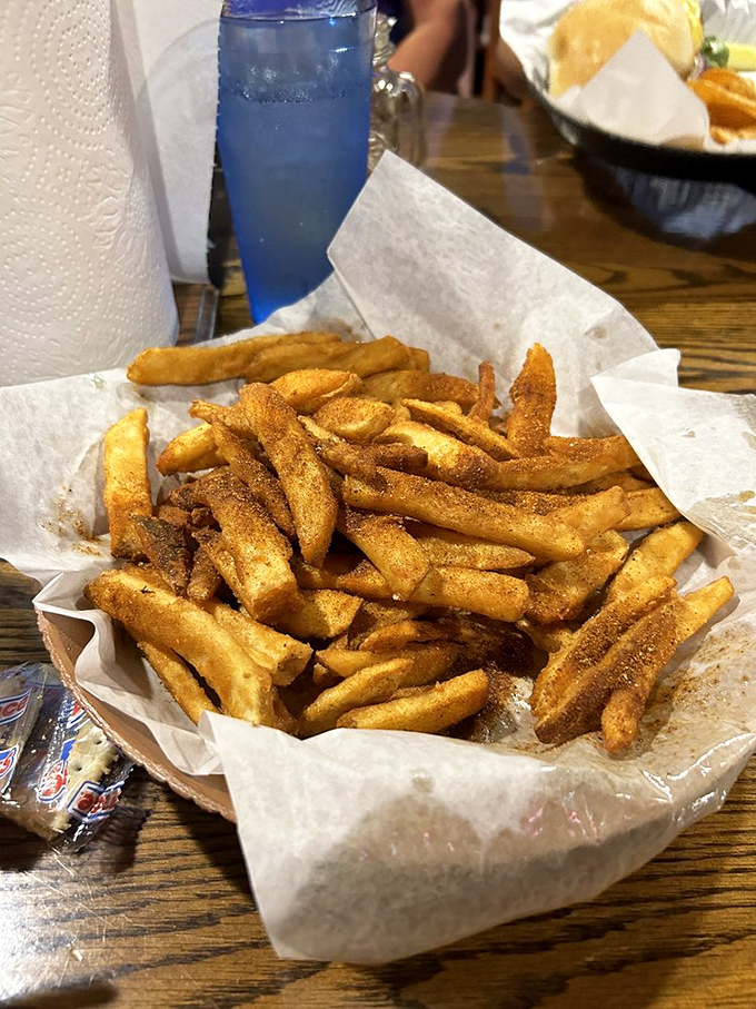 These aren't just fries—they're golden wands of potato perfection that make you question why you ever wasted stomach space on lesser versions.