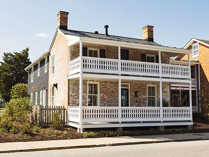 This historic brick building with its double-decker porches has witnessed centuries of Chesapeake Bay life—if only those white railings could talk.