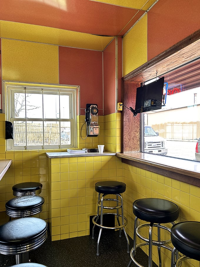 Yellow tiles and chrome stools—not designed by an influencer, but by generations of people who understand comfort.