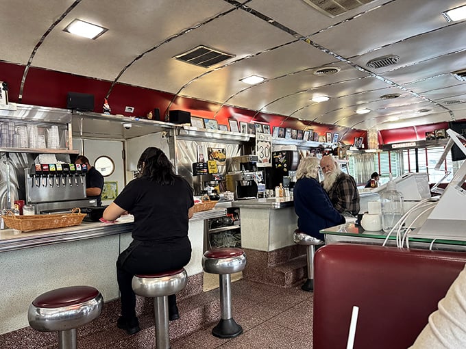 The diner's heart and soul captured in one frame. Notice how the regulars at the counter look perfectly at home, like they're sitting in their own kitchens.