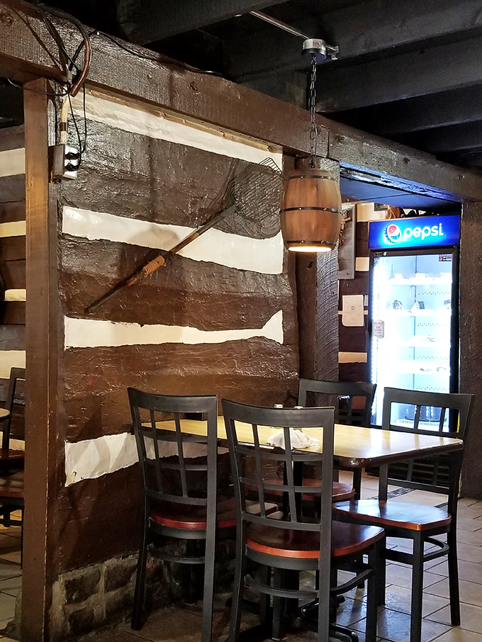 Exposed log walls and barrel lighting fixtures—because your chicken fried steak tastes better with a side of Kentucky heritage.