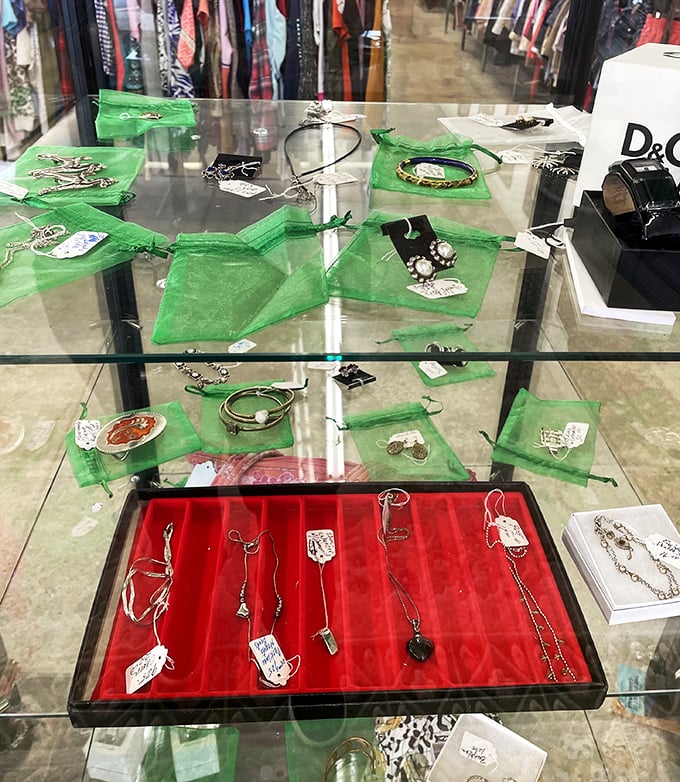 Jewelry displayed like archaeological treasures—each piece carrying stories from previous lives while awaiting its next chapter.