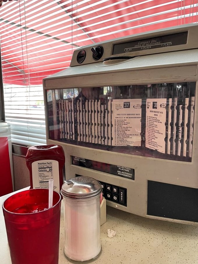 The tabletop jukebox promises vintage tunes with your meal. Five plays for a quarter—nostalgia has never been so affordable.