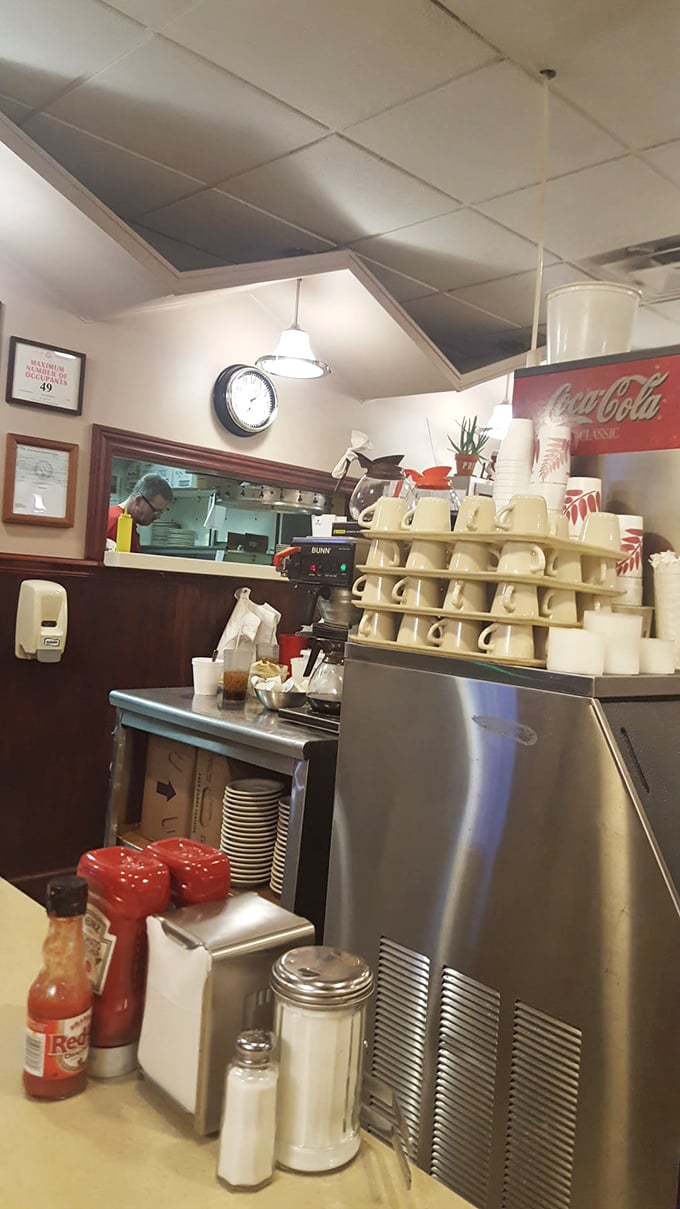 Coffee station poetry—the rhythmic dance of mugs, cream, and caffeine that keeps this Cincinnati institution humming along.